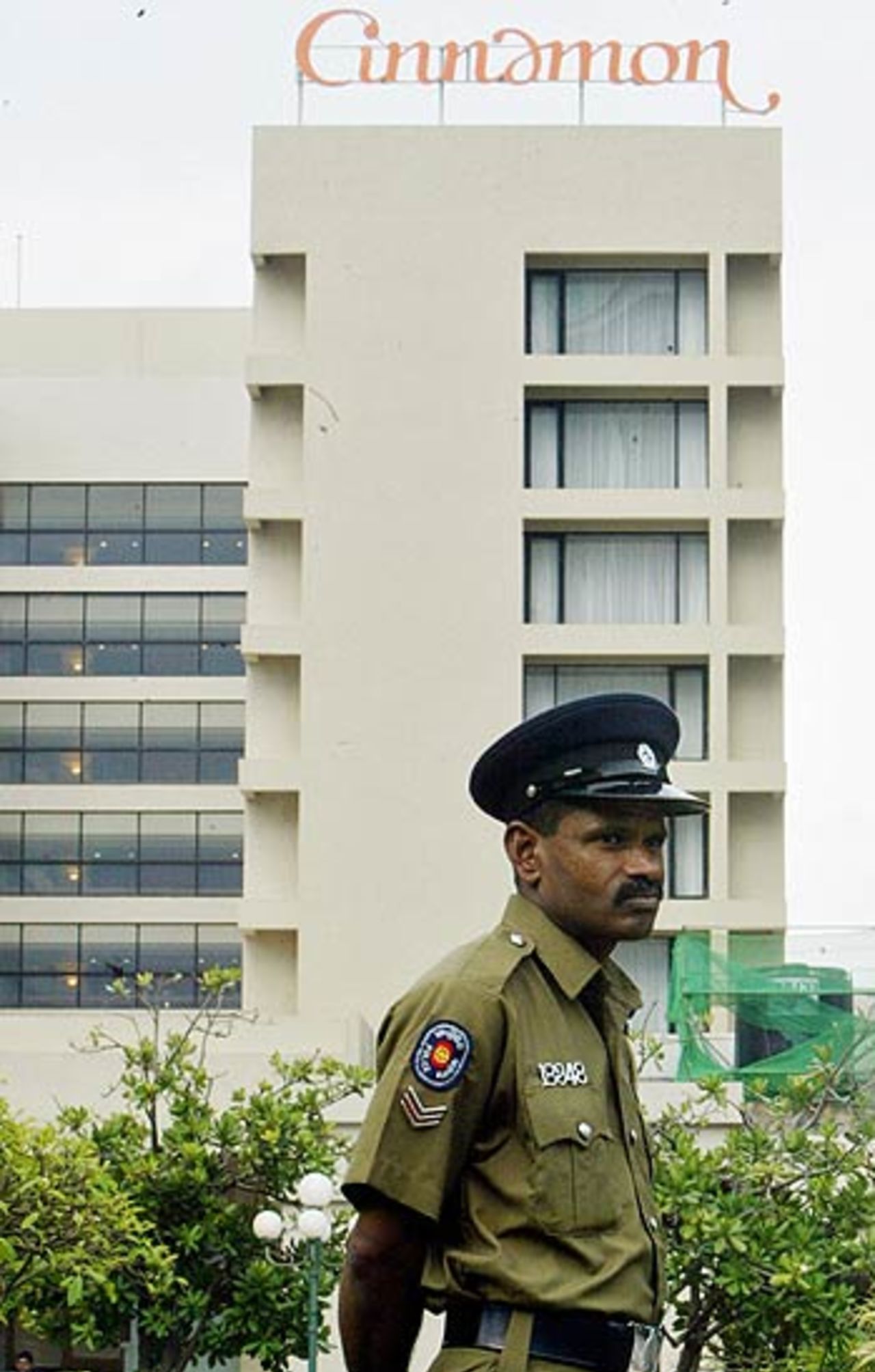A policeman keeps vigil outside the hotel where the South African team ...