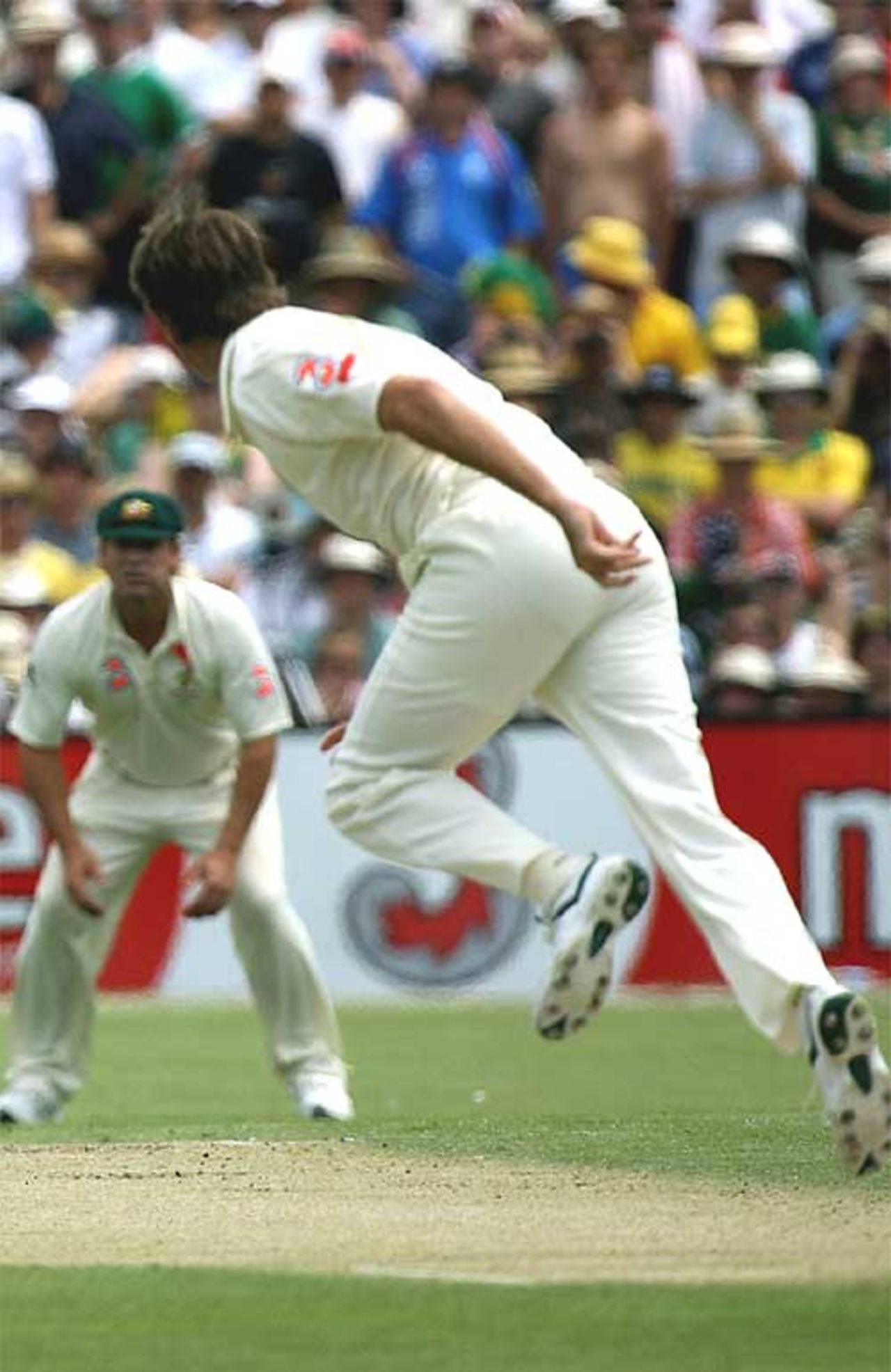 Glenn McGrath, showing no signs of his heel injury, lets fly early on ...
