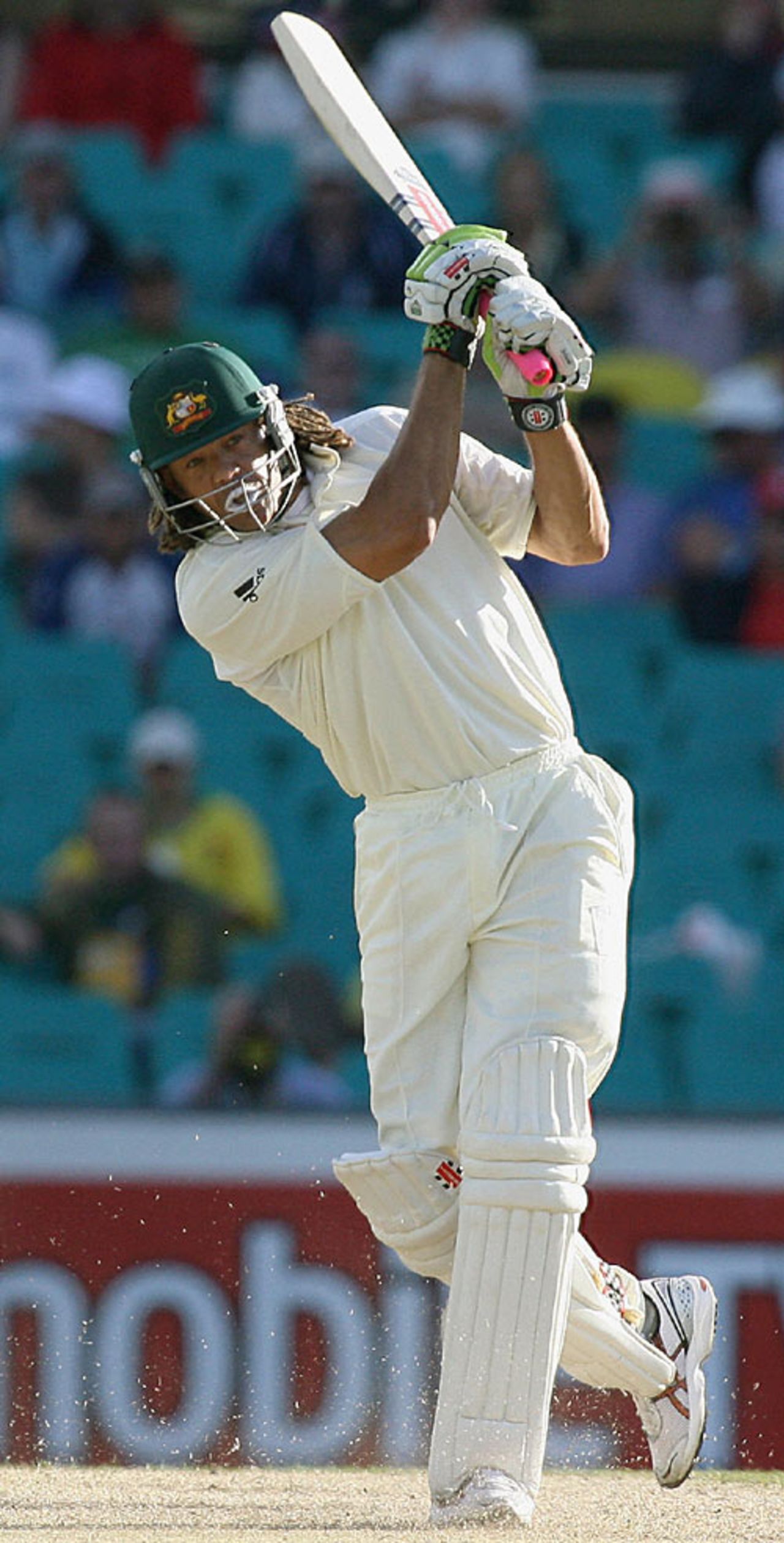 Andrew Symonds bangs Monty Panesar down the ground for four ...