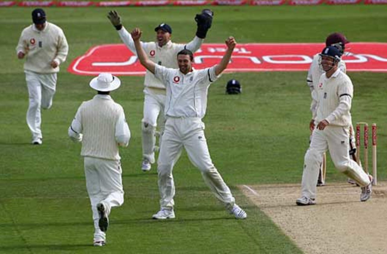 Jerome Taylor watches his bail tumble as Steve Harmison celebrates the ...