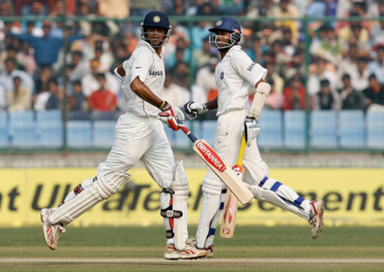 Rahul Dravid and Wasim Jaffer pick up a single during their 82-run ...