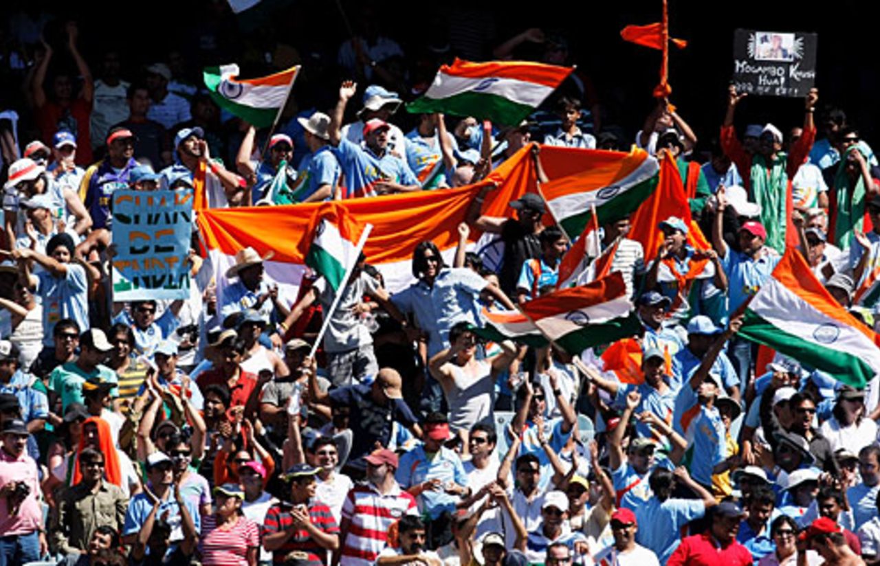 Indian fans wave flags and cheer the side on | ESPNcricinfo.com