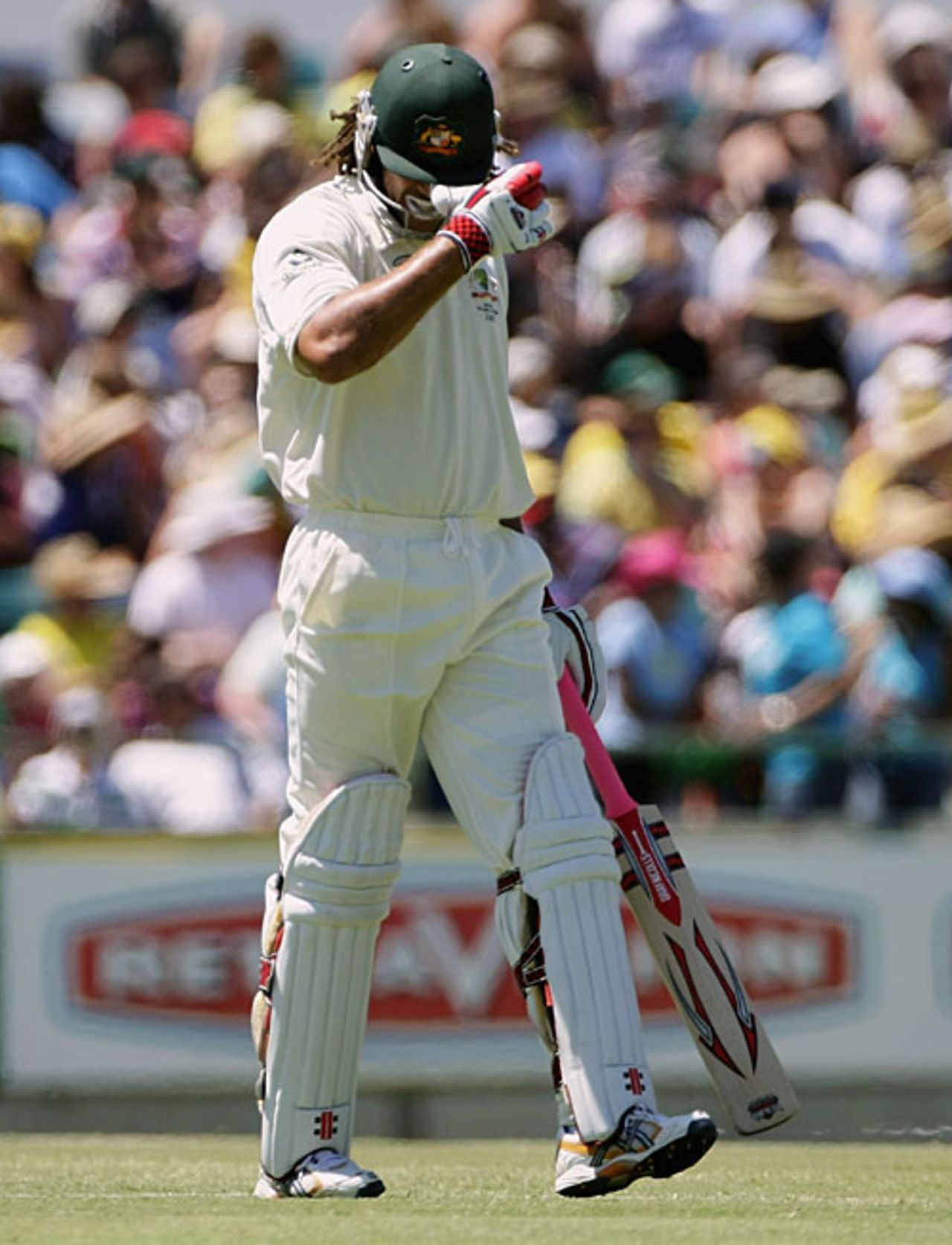 Team-mates congratulate Anil Kumble on dismissing Andrew Symonds ...
