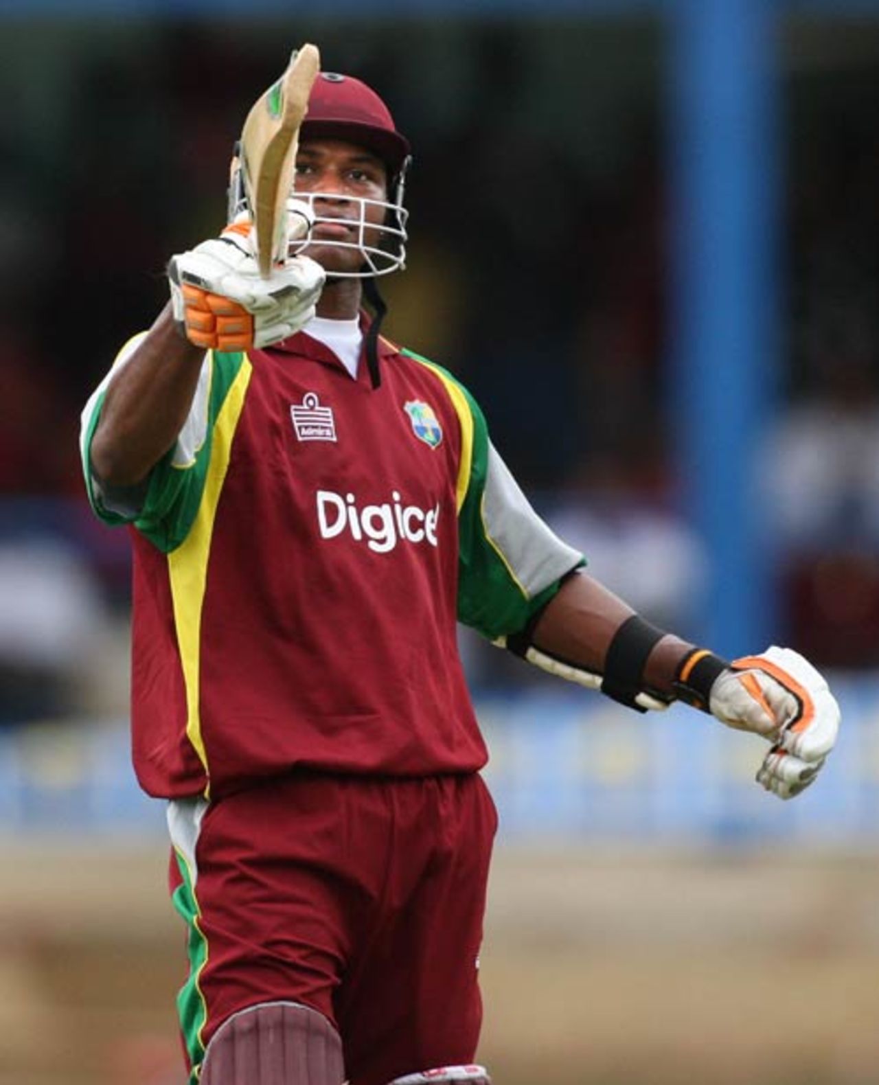 Marlon Samuels celebrates his half-century | ESPNcricinfo.com