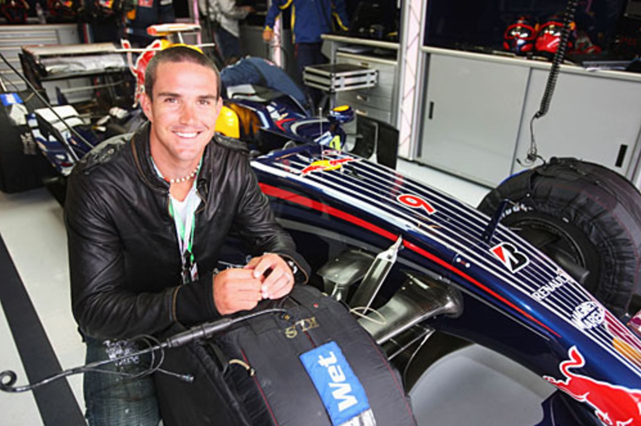 Kevin Pietersen visits the Red Bull Renault garage at the British F1 ...