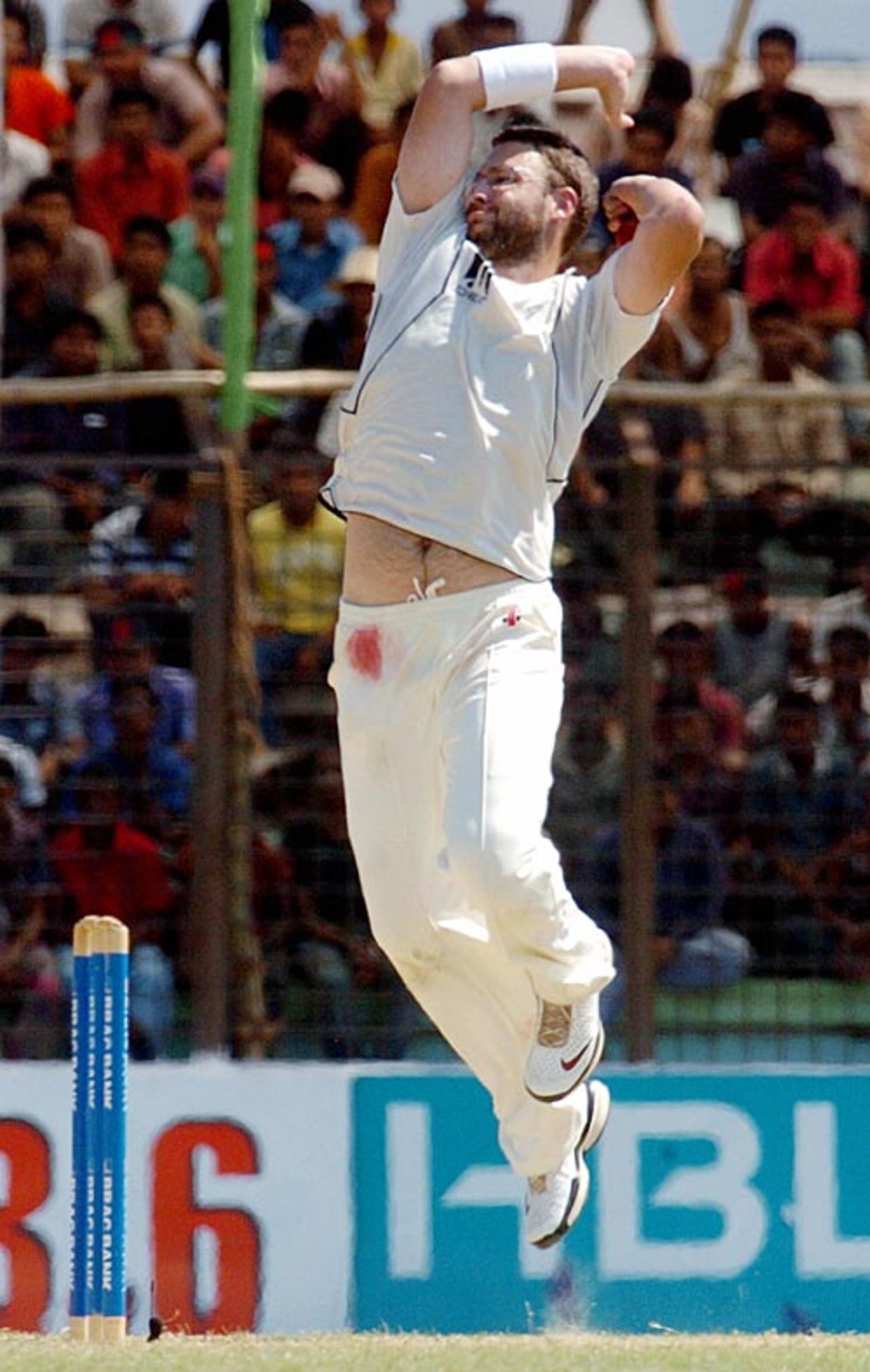 New Zealand players celebrate the fall of another Bangladesh wicket ...