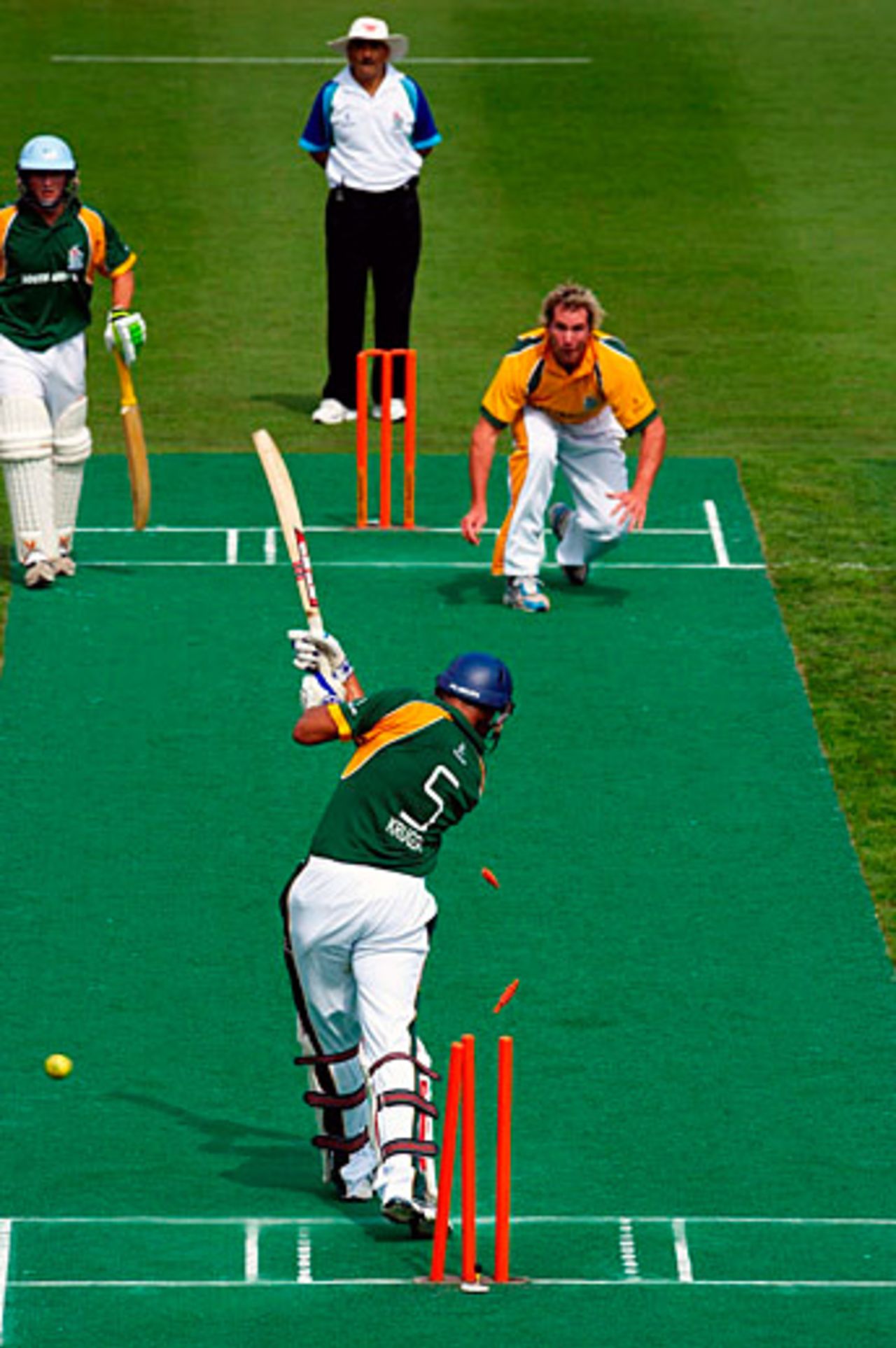 South Africa's Alan Kruger is bowled by Australia's John Hastings on ...