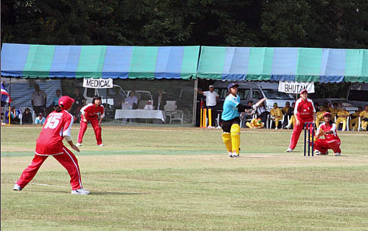 Thailand's Pimpika Jindam hits the winning runs against Hong Kong ...