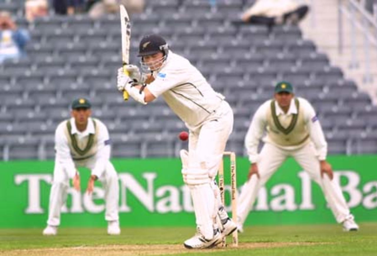Fleming cuts a ball from Saqlain during his innings of 32 ...