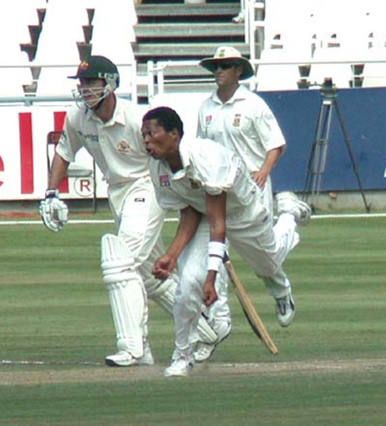 Makhaya Ntini looks in anticipation as Damien Martyn and Gary Kirsten ...