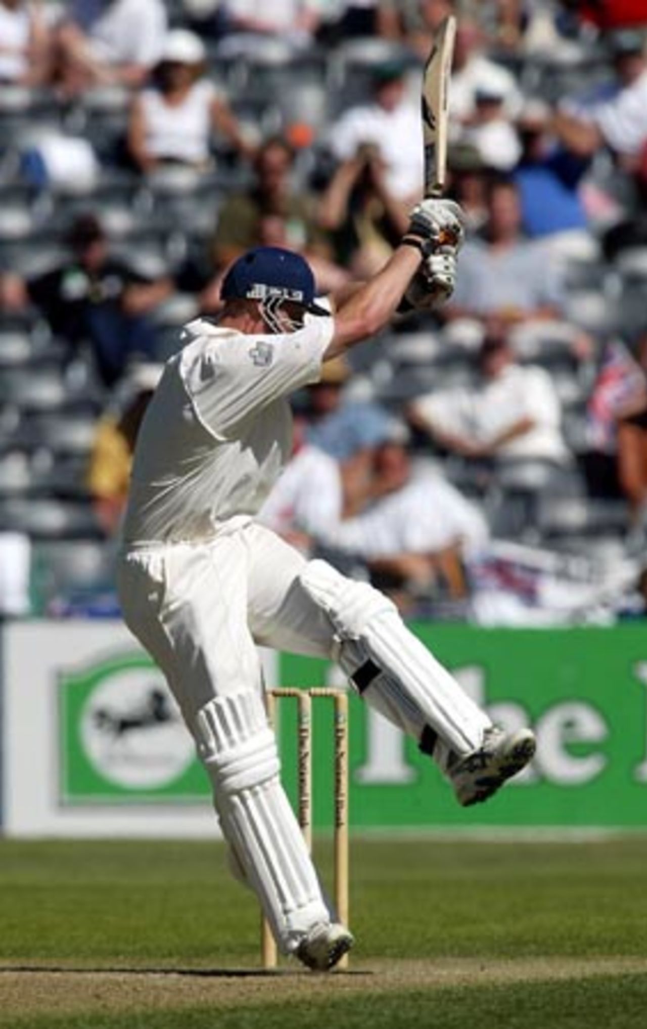Flintoff raises his bat to celebrate reaching his century. 1st Test ...