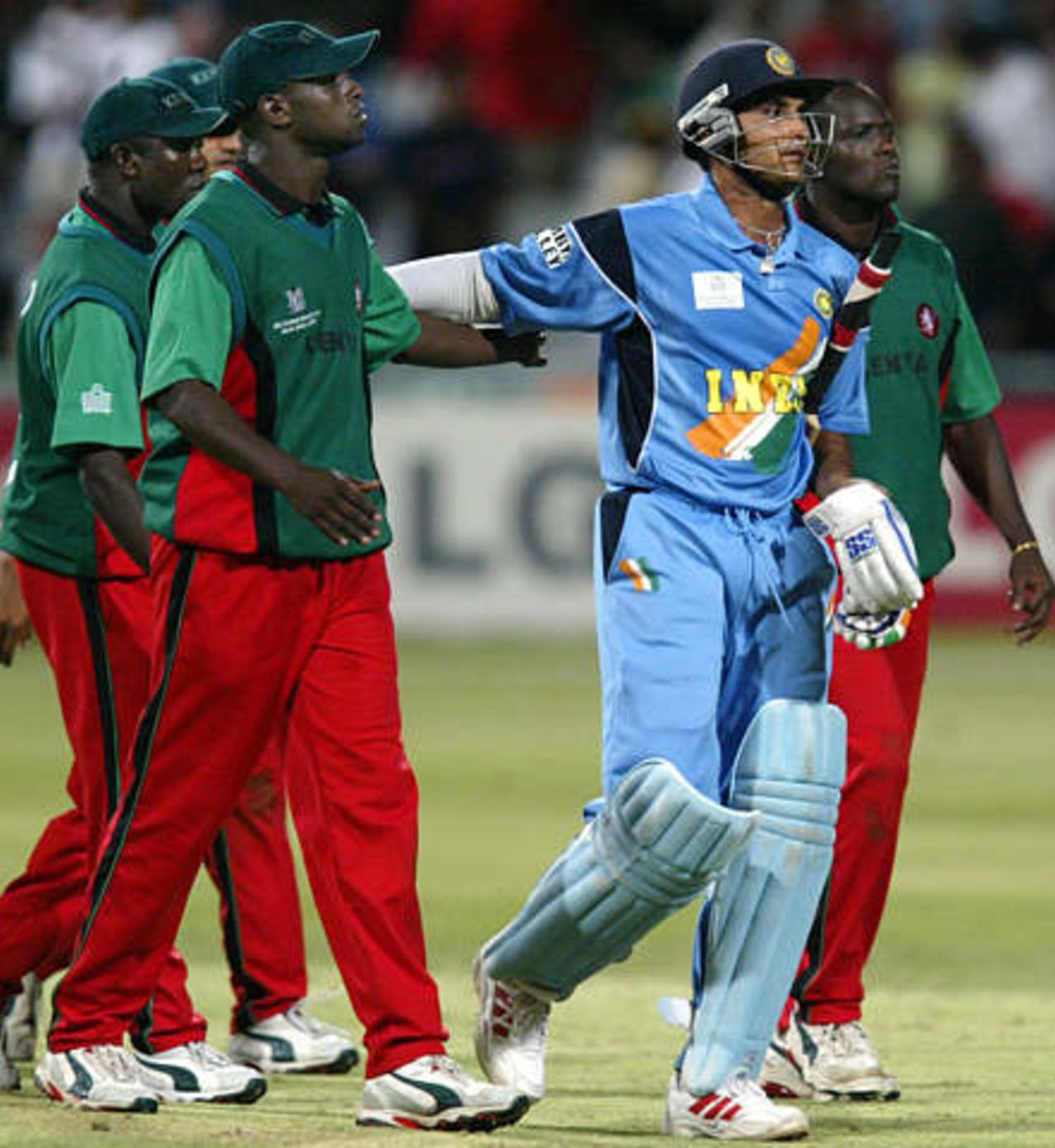 Ganguly walks back to the pavilion after India's win over Kenya ...