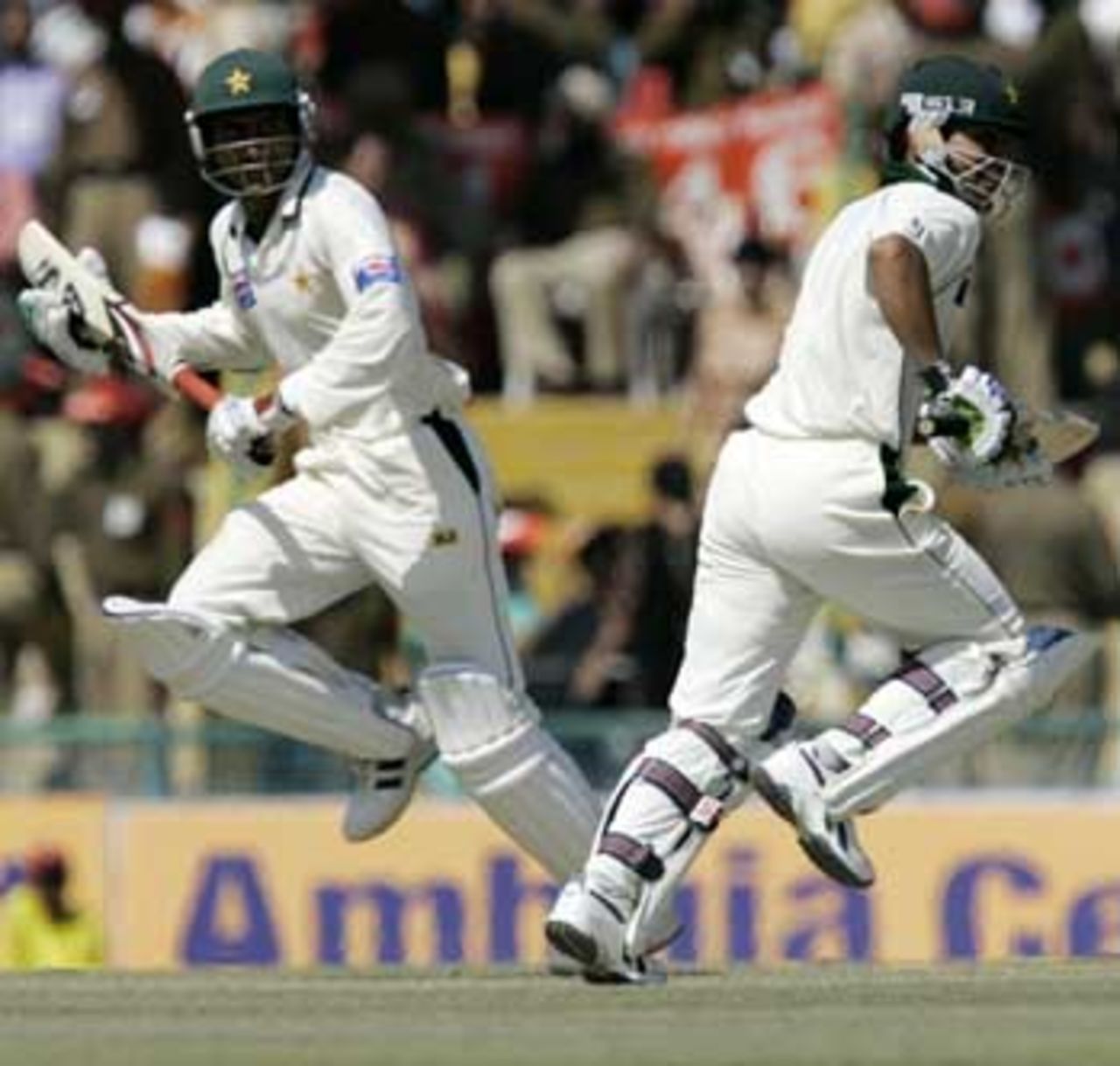 Abdul Razzaq and Kamran Akmal put their heads down, running like hares ...