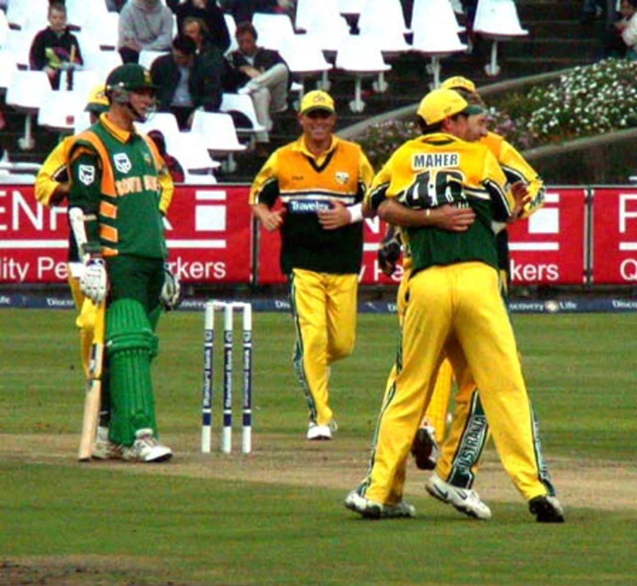 Well done mate! Jimmy Maher congratulates Andy Bichel with Herschelle ...