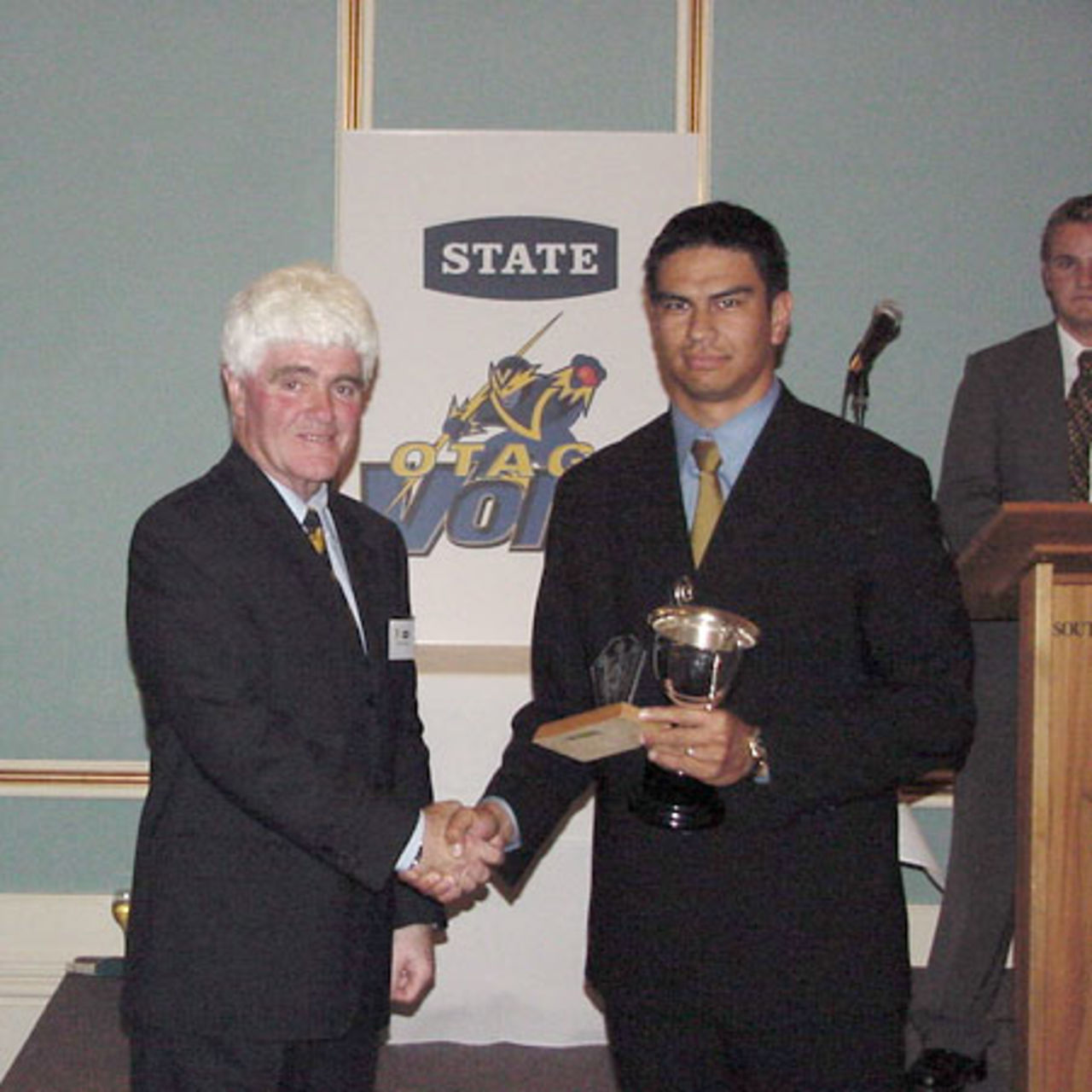 Pullar is presented the 2001/02 Otago women's player of the year award ...