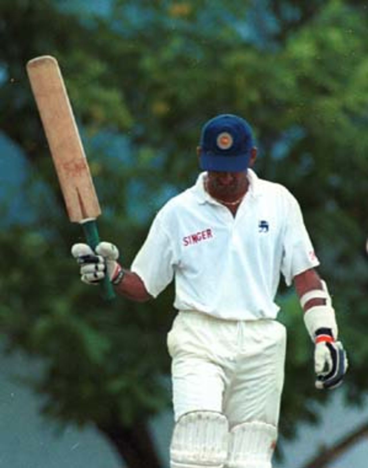 Sri Lankan Batsman Marvan Atapattu Celebrates Reaching 100 Runs sri-lankan-batsman-marvan-atapattu-celebrates-reaching-100-runs