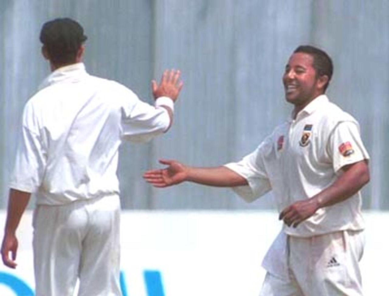 Ntini congratulated by Boucher after picking up the wicket of Atapattu ...