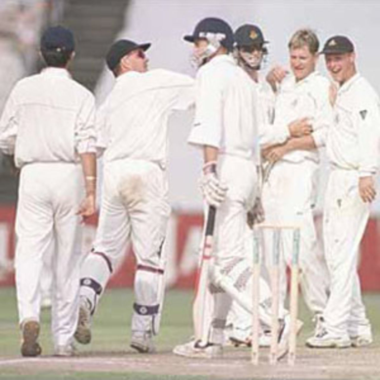 Chapple and Keedy hug each other after Lewis's fall | ESPNcricinfo.com