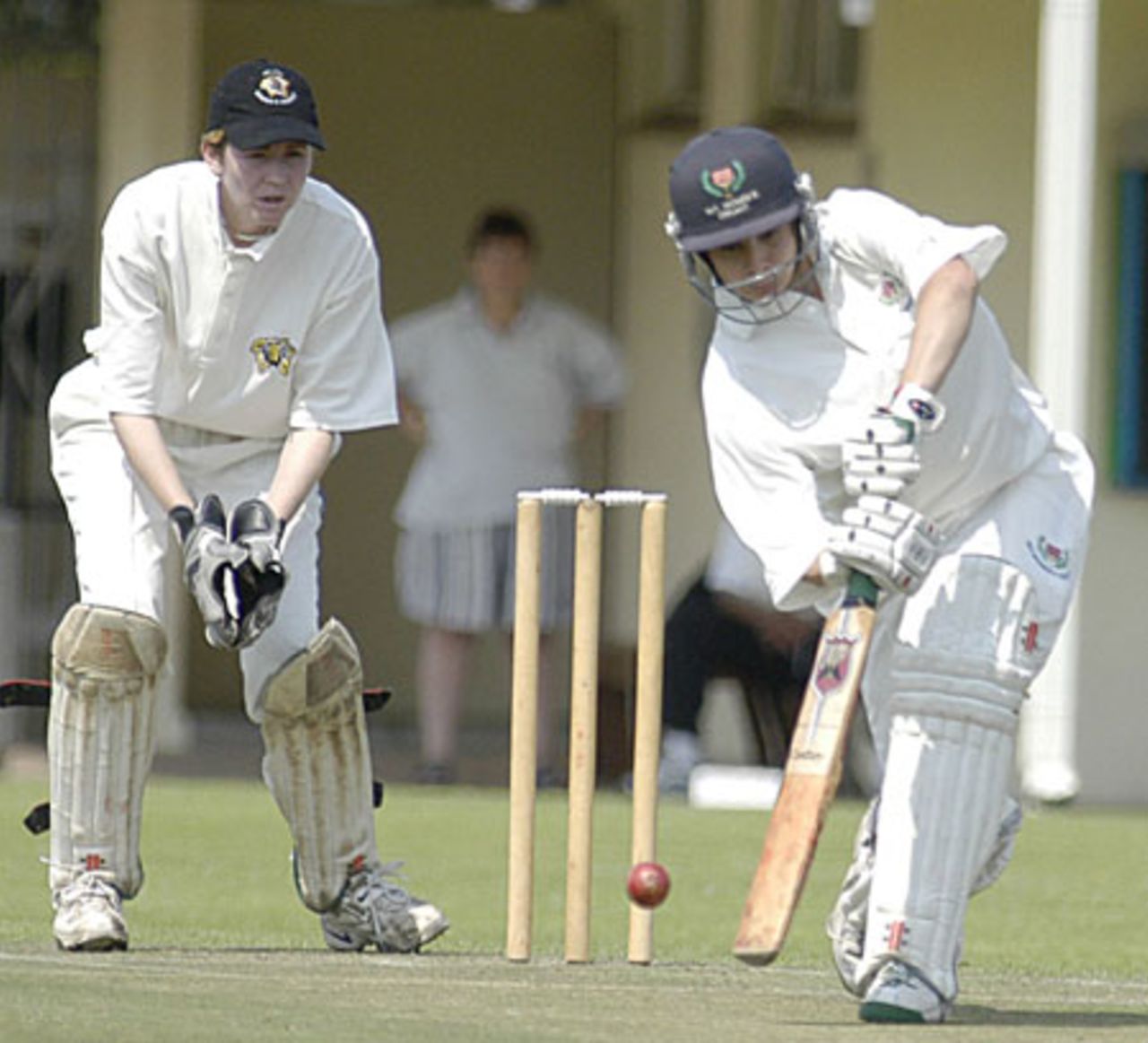Alexis le Britton drives a ball during a womens cricket match against ...