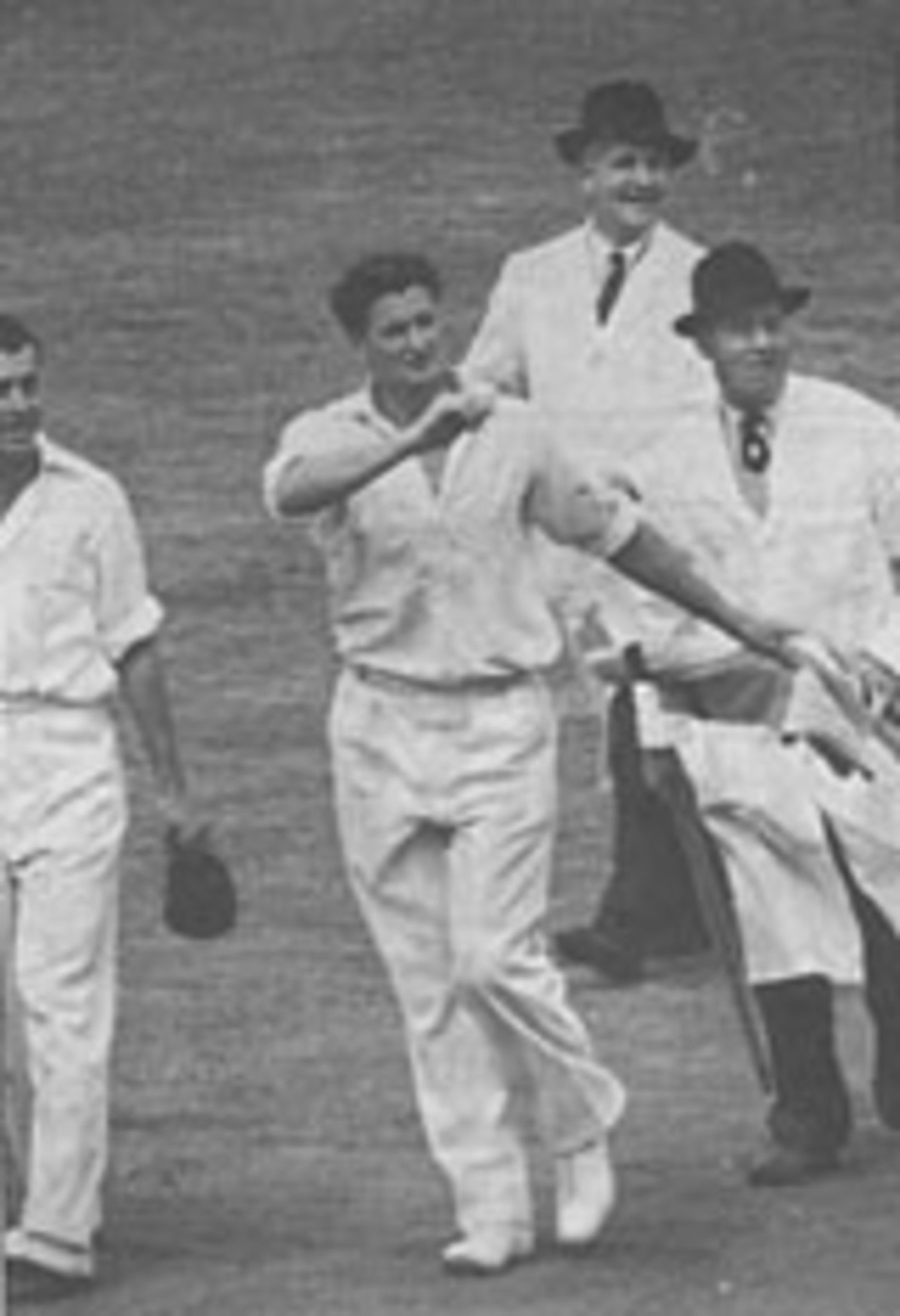 Keith Miller tosses the bails into the crowd after his final Test at ...