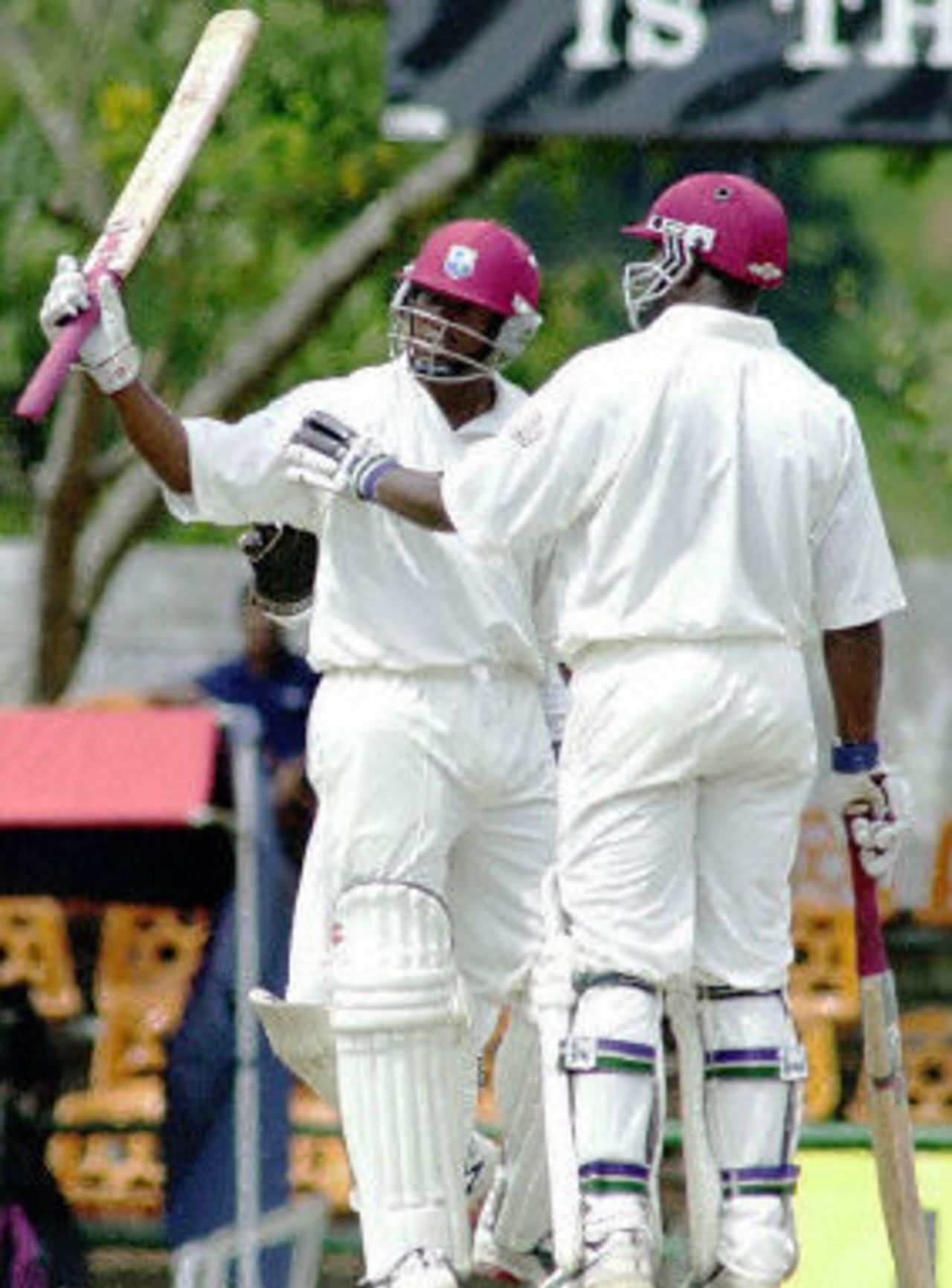 Brian Lara acknowledges the crowd after completing his half century | ESPNcricinfo.com