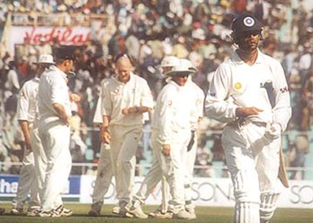 Sachin Tendulkar acknowledges the uproarious applause after his century ...