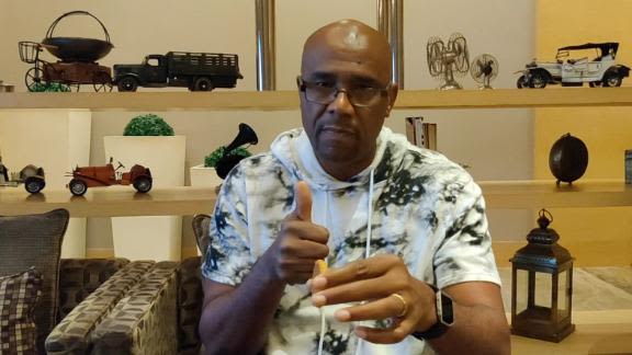 Ian Bishop demonstrates the ideal wrist position for fast bowlers ...