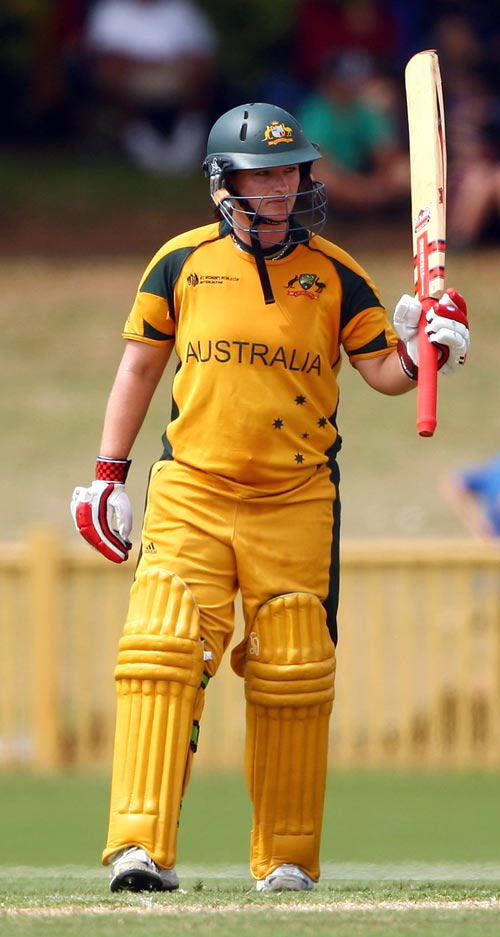 Karen Rolton raises her bat on reaching her half-century | ESPNcricinfo.com