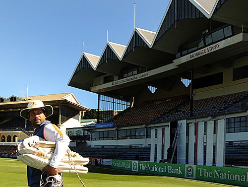 Sachin Tendulkar walks out for practice at the sunny Basin Reserve ...