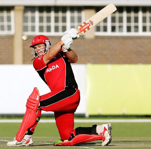 Canada's Ian Billcliff swipes the ball towards midwicket | ESPNcricinfo.com