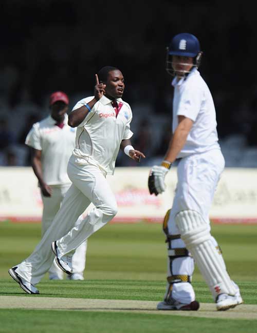 Fidel Edwards sets off in celebration after bowling Alastair Cook ...
