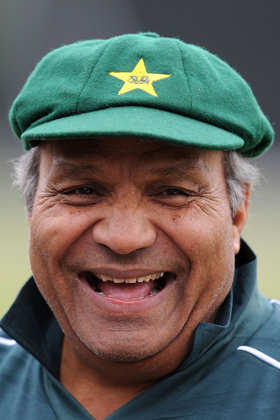 A cheerful Intikhab Alam looks on during a training session ...