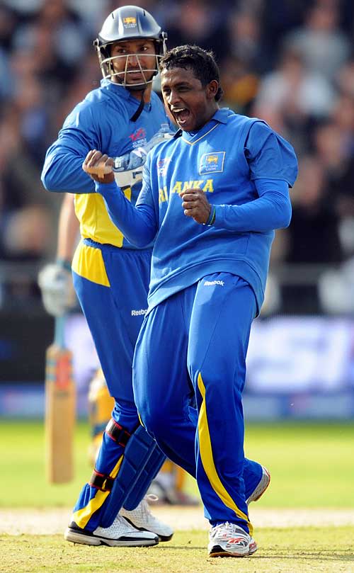 Ajantha Mendis enjoys one of his three wickets | ESPNcricinfo.com