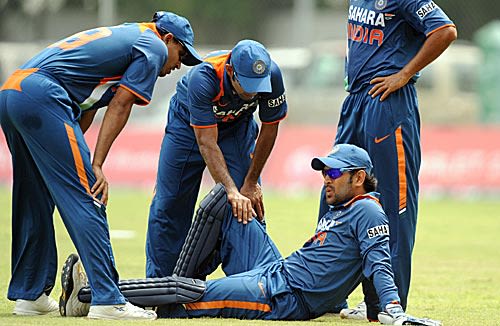 MS Dhoni survived a momentary scare after twisting his ankle ...