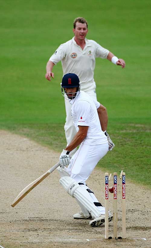 Sajid Mahmood watches the ball bounce onto his stumps as Brett Lee ...