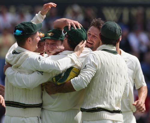 The Australians celebrate Ben Hilfenhaus' breakthrough | ESPNcricinfo.com