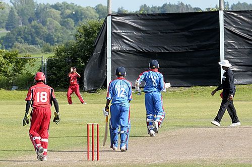 A Canada player gets in position to take a catch in the deep ...
