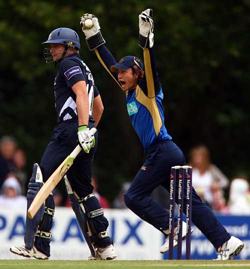 Tom Burrows goes up for a catch to remove Luke Wright | ESPNcricinfo.com