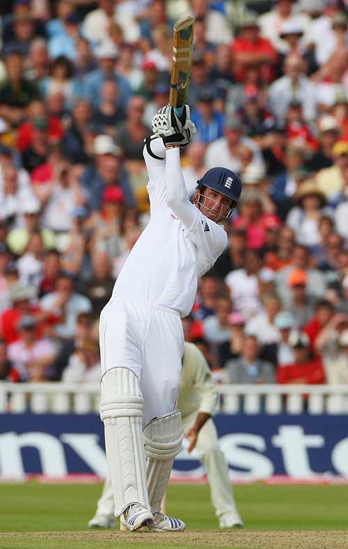 Stuart Broad rifles a powerful drive down the ground during his 55 ...