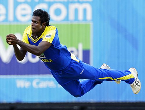 Angelo Mathews takes a smart catch off his own bowling to send back ...