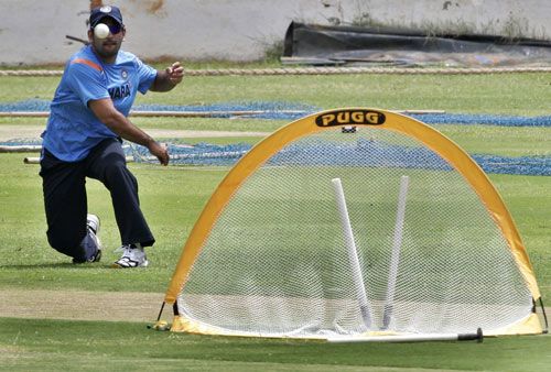 MS Dhoni during a fielding drill at the National Cricket Academy ...