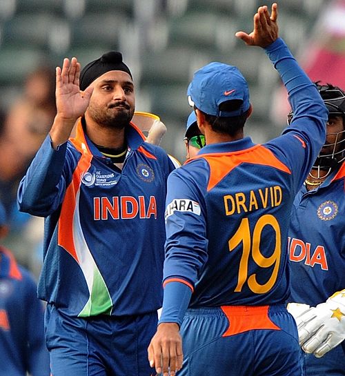 Harbhajan Singh is congratulated on removing Royston Crandon ...