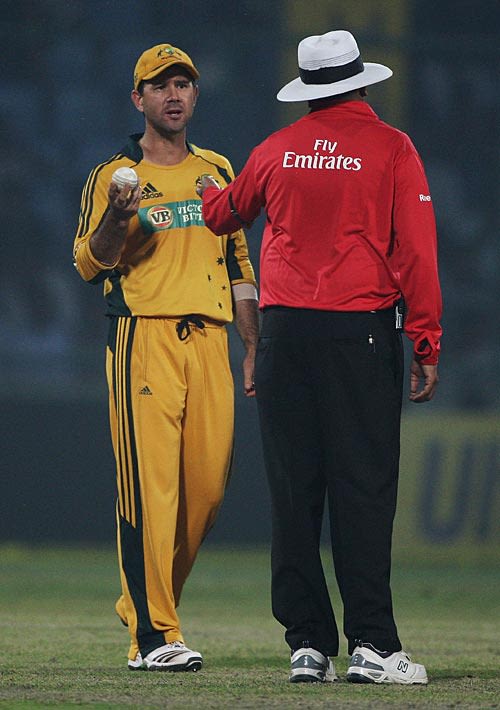 Ricky Ponting discusses the ball with the umpire | ESPNcricinfo.com