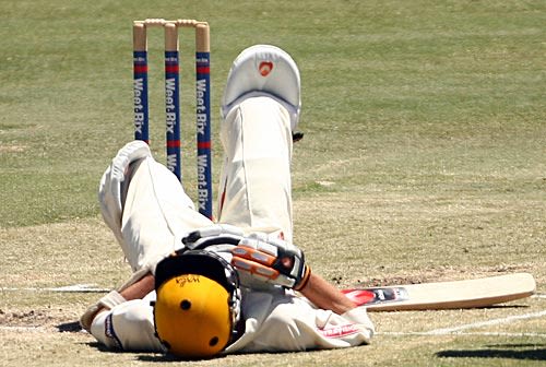 Michael Hogan was felled by a bouncer from Doug Bollinger ...