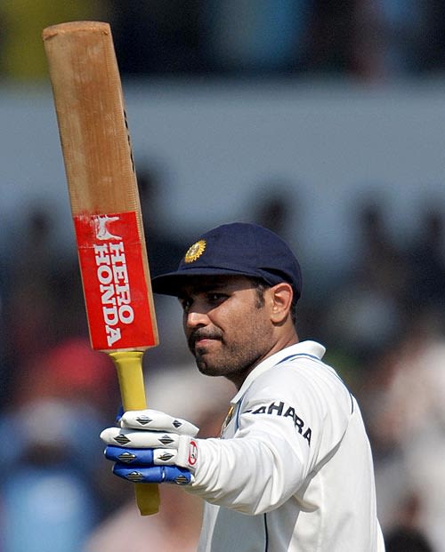 Virender Sehwag celebrates his hundred | ESPNcricinfo.com