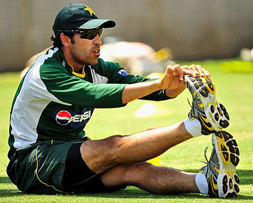 Umar Gul stretches during a training session | ESPNcricinfo.com