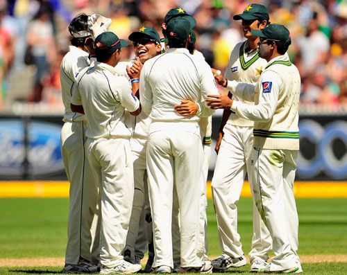 The Pakistan players can't believe their luck after running out Shane ...