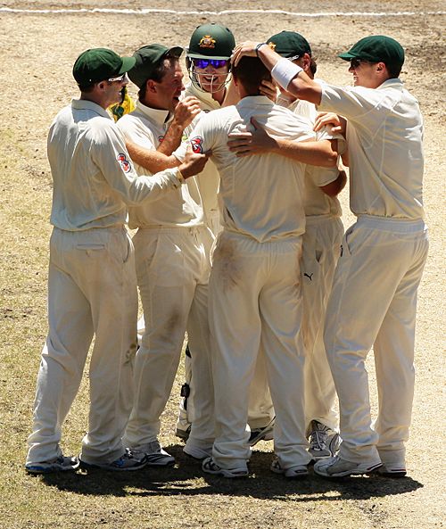 Nathan Hauritz is mobbed after sealing victory | ESPNcricinfo.com