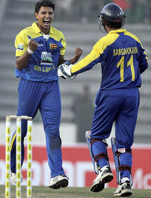 Suraj Randiv celebrates the dismissal of Mushfiqur Rahim with Kumar ...