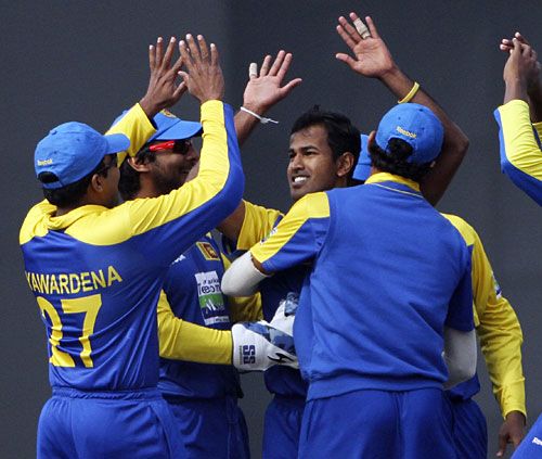 Nuwan Kulasekara gets the high-fives after removing Gautam Gambhir in the frist over ...